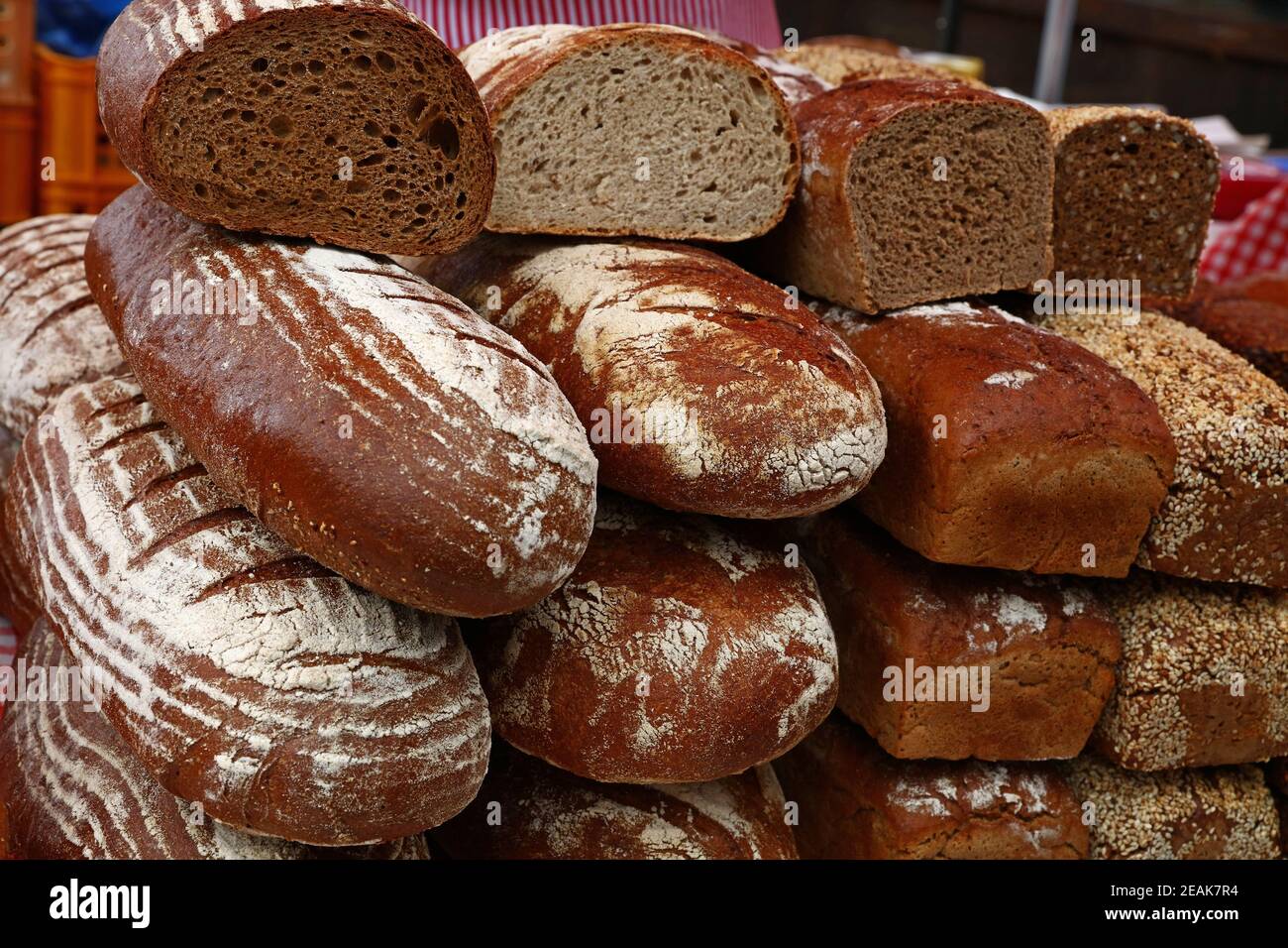 Assorted fresh bread loaves on retail display Stock Photo - Alamy