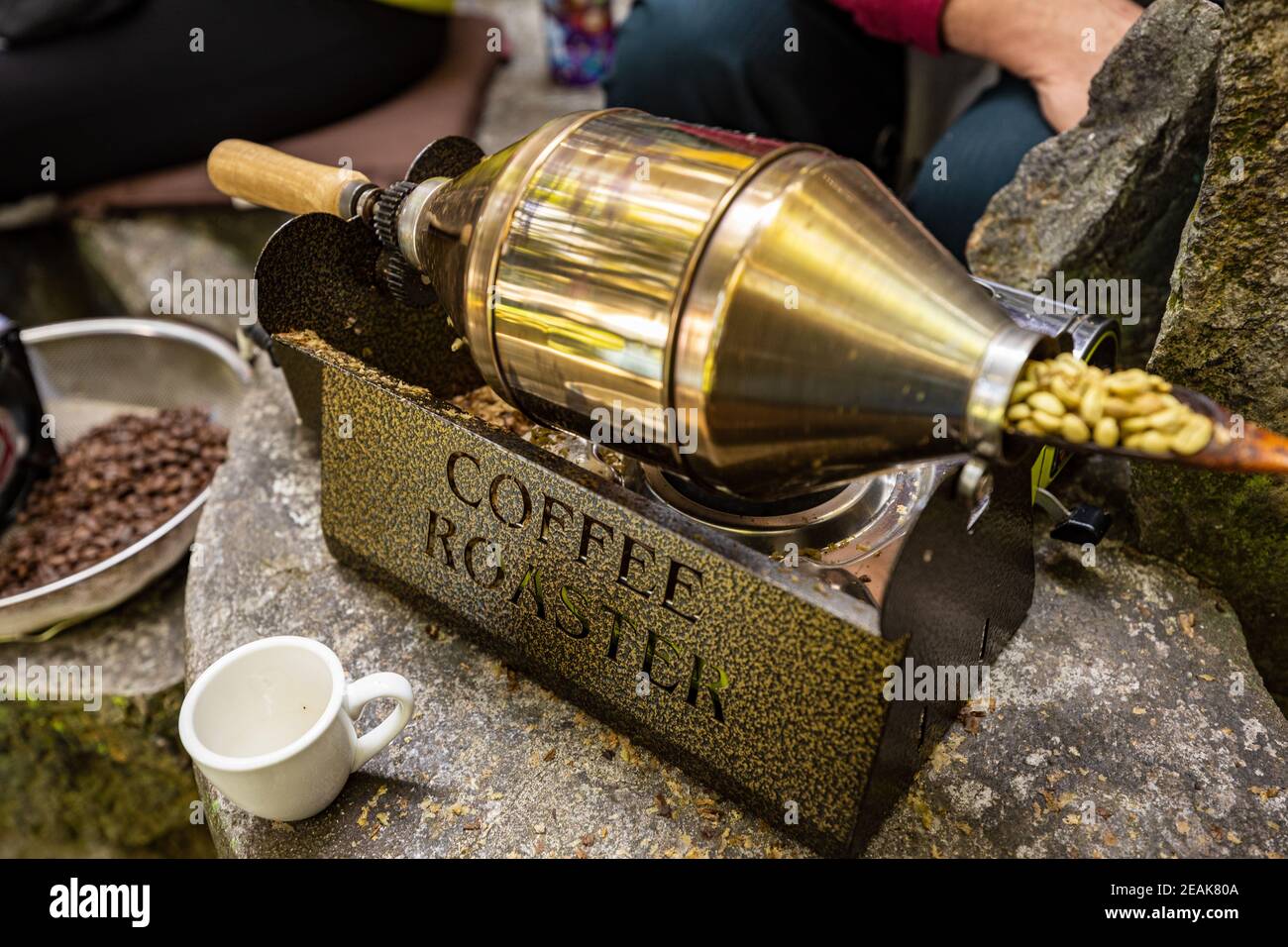 Coffee roasting with a small roaster at home Stock Photo - Alamy