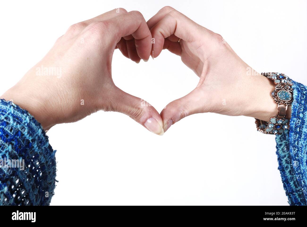 Person making heart shape hi-res stock photography and images - Alamy