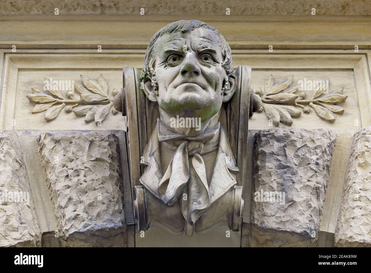 stone head of a house facade Stock Photo - Alamy
