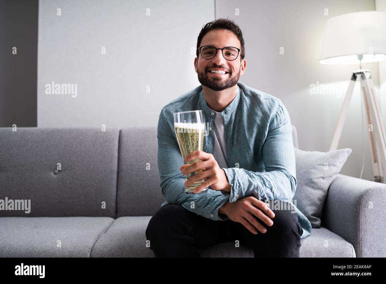 Man Drinking Beverage Beer In Video Conference Stock Photo - Alamy