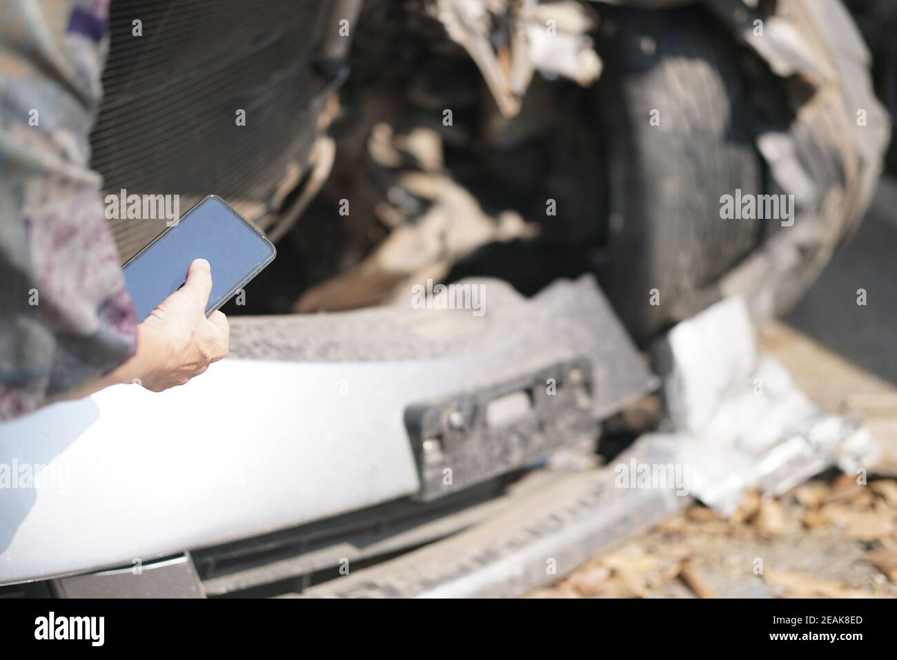 hand take photo of crashed damaged broken car. automobile crash ...