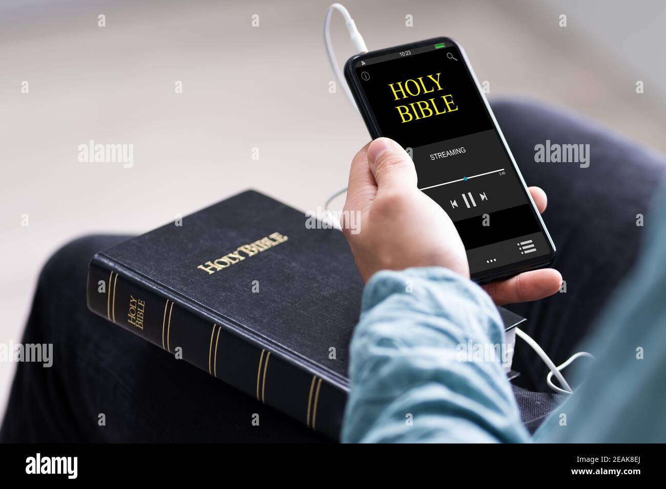 Christian Man Reading Bible Book And Praying Stock Photo - Alamy