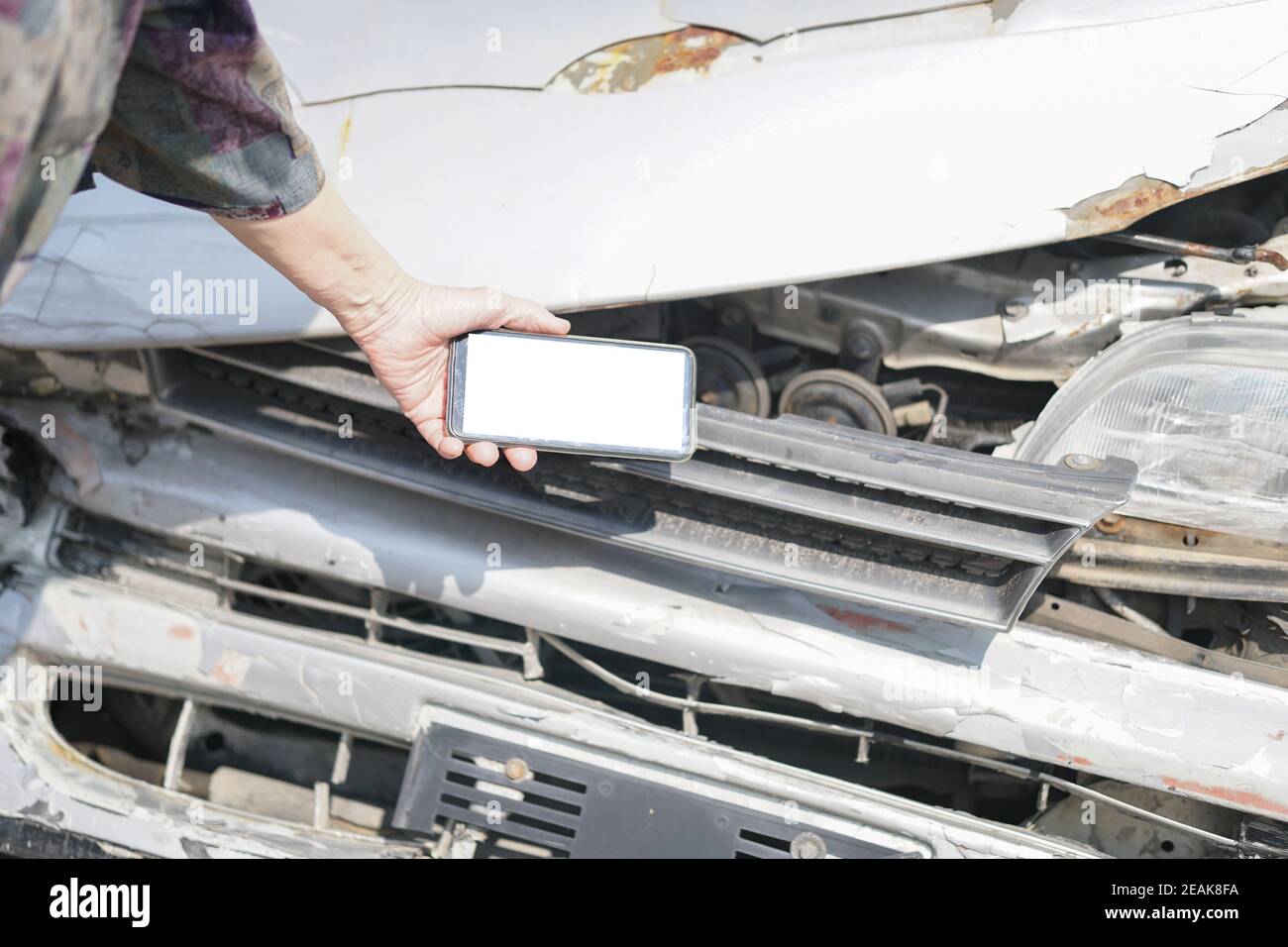 hand take photo of crashed damaged broken car. automobile crash ...