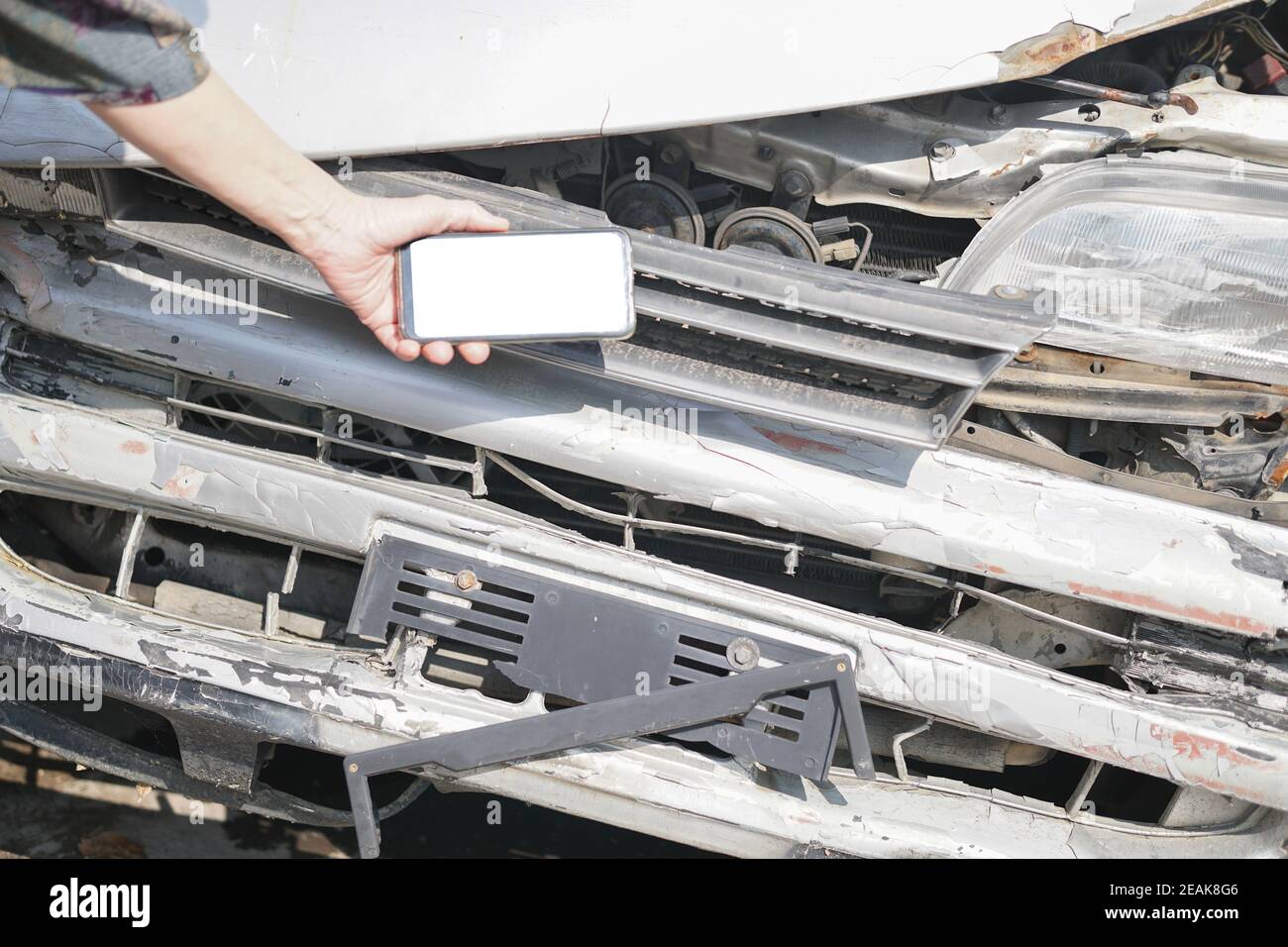 hand take photo of crashed damaged broken car. automobile crash ...