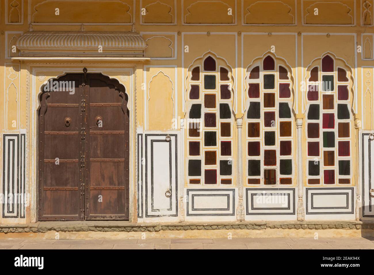 Hawa Mahal hall wooden gate and colorful windows. Jaipur, Rajasthan ...