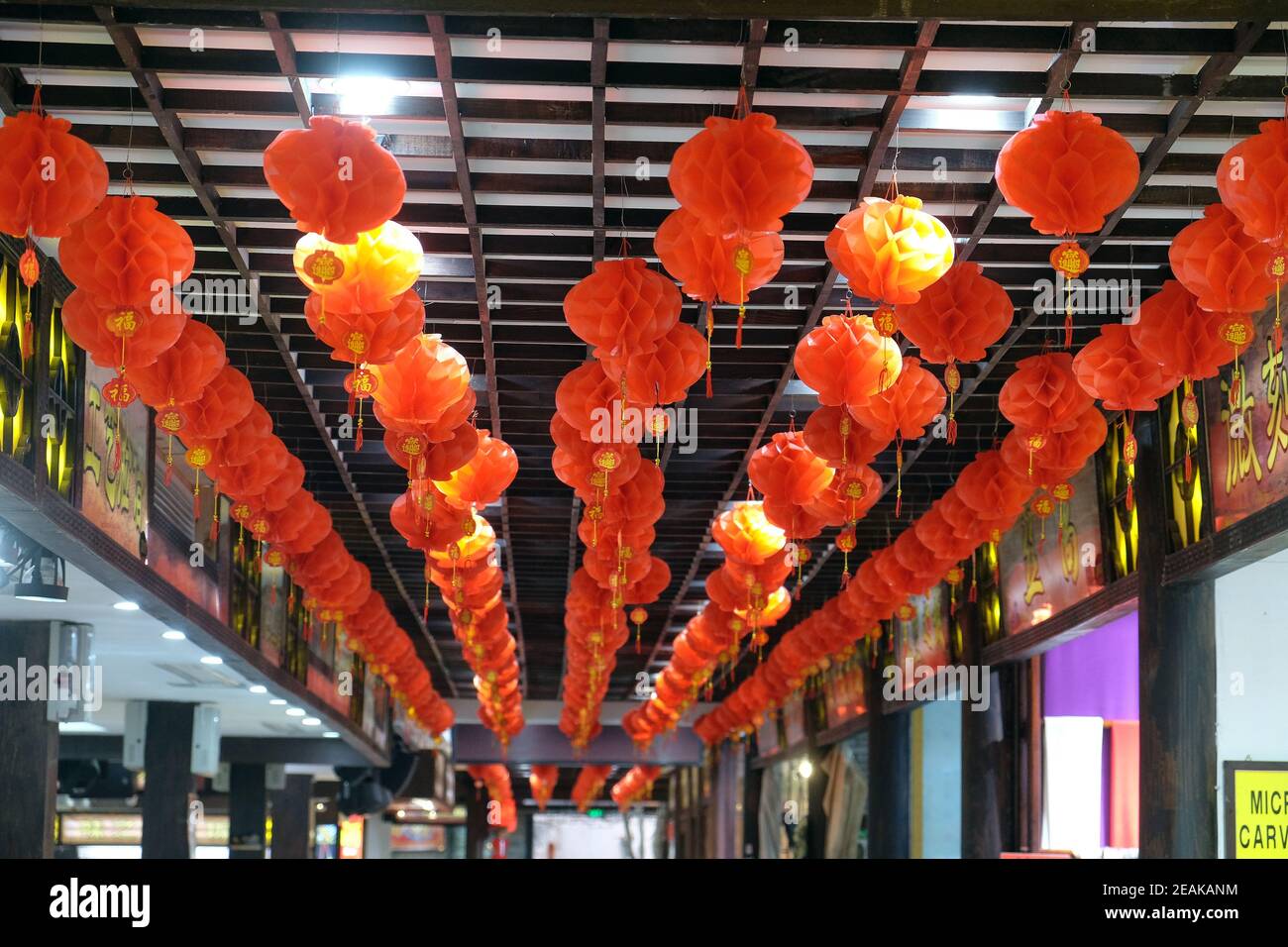 Traditional Chinese lanterns in the streets along the canal in Xitang town in Zhejiang Province ...