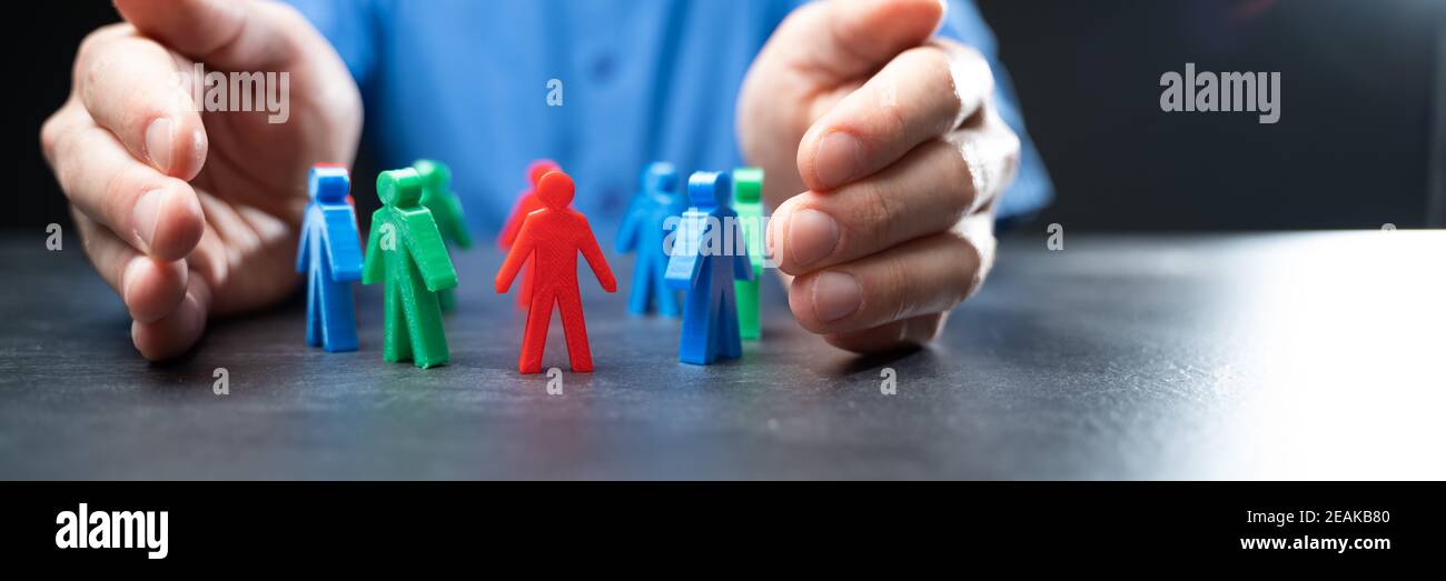 Hands Protecting Paper People Stock Photo - Alamy