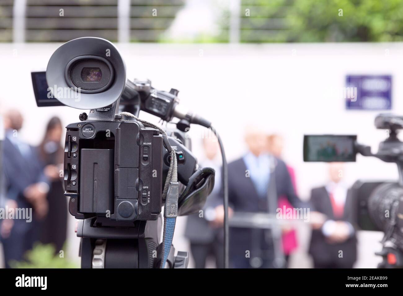 Filming news or press conference with a video camera Stock Photo - Alamy