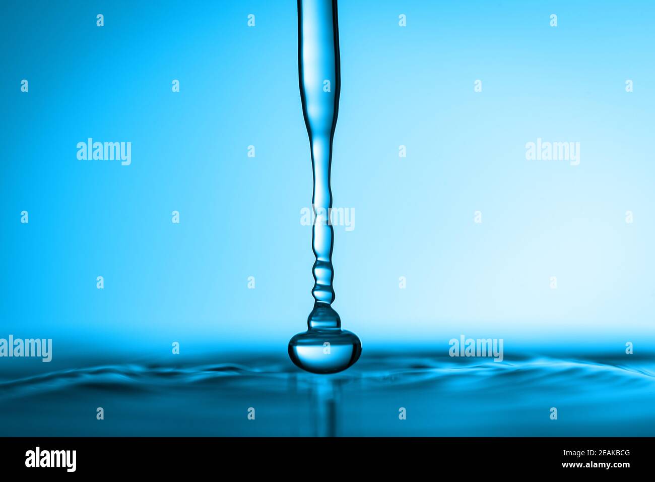 Blue water drop falling down hi-res stock photography and images - Alamy