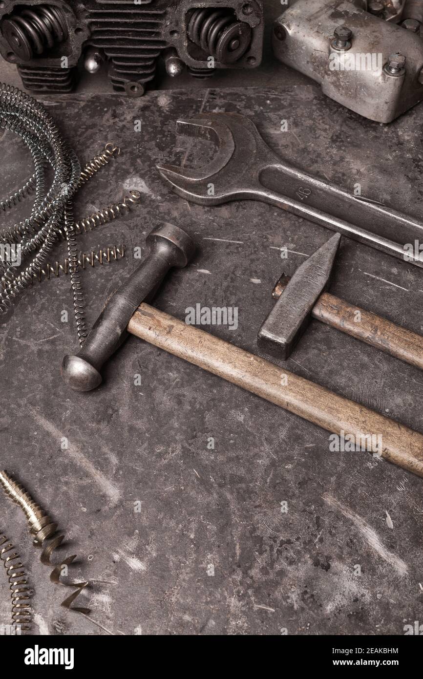 Old tools set on a vintage metallic background with space for text ...