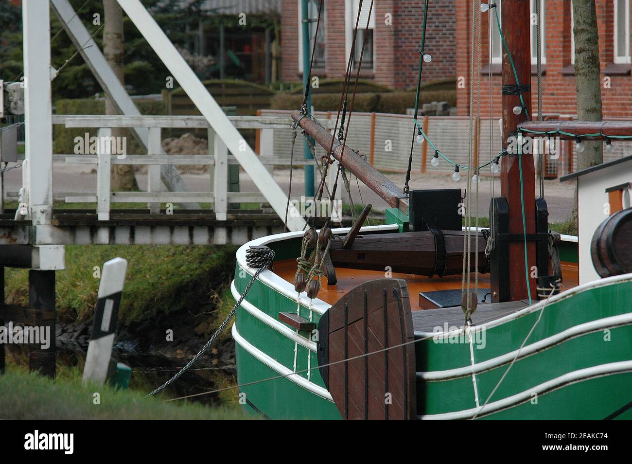 boats and mills in the german eastern frisia Stock Photo - Alamy