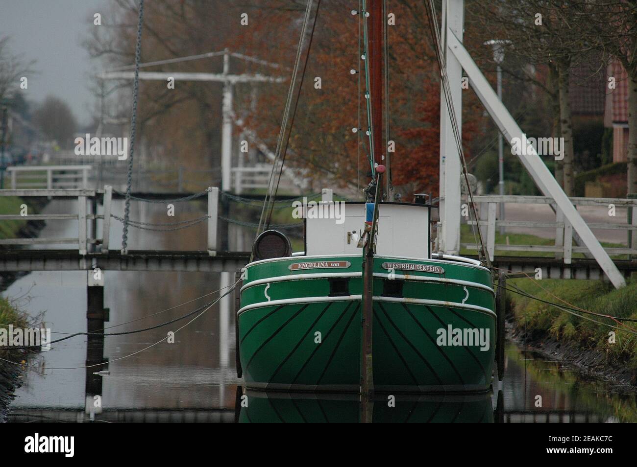 boats and mills in the german eastern frisia Stock Photo - Alamy