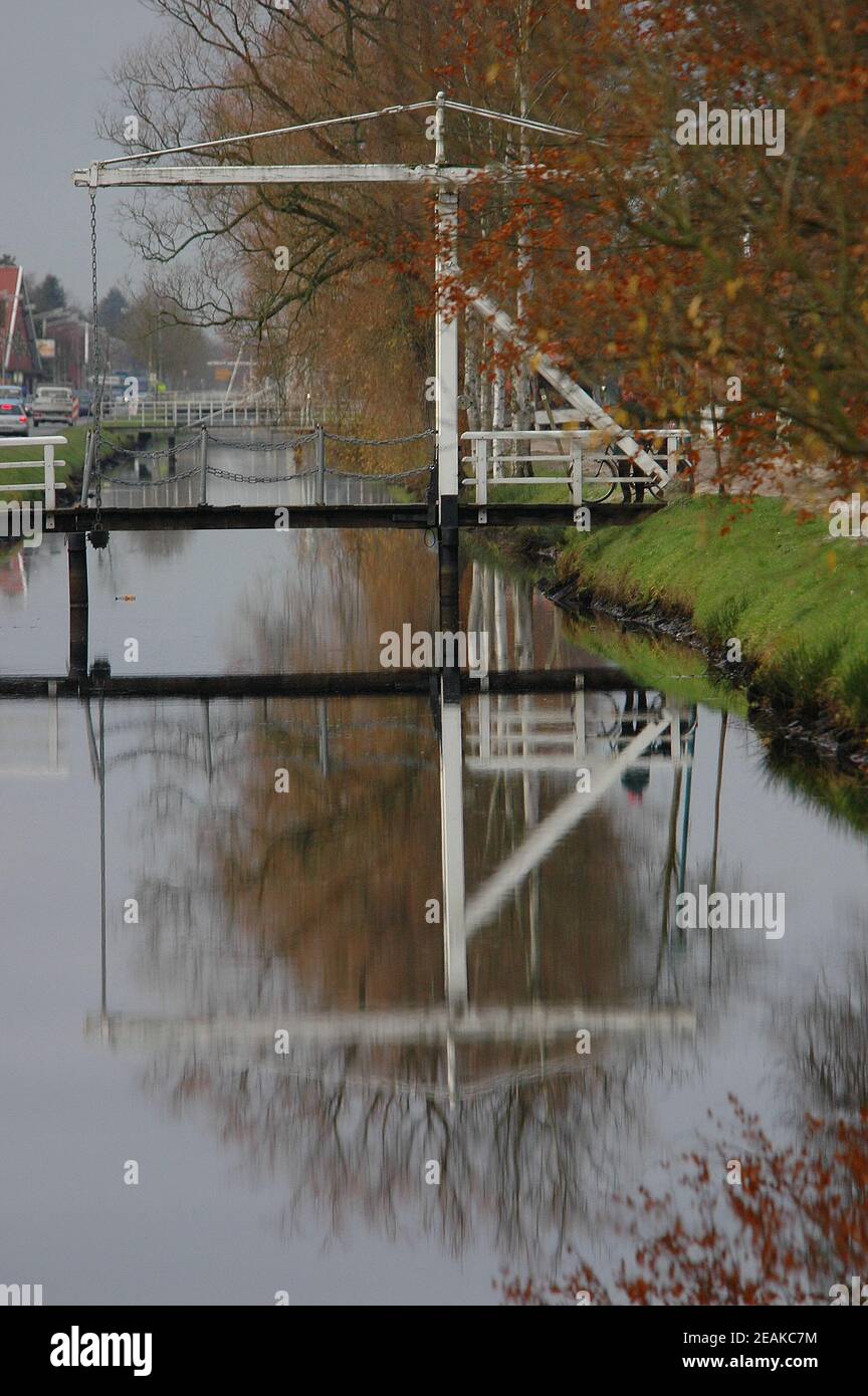 boats and mills in the german eastern frisia Stock Photo - Alamy