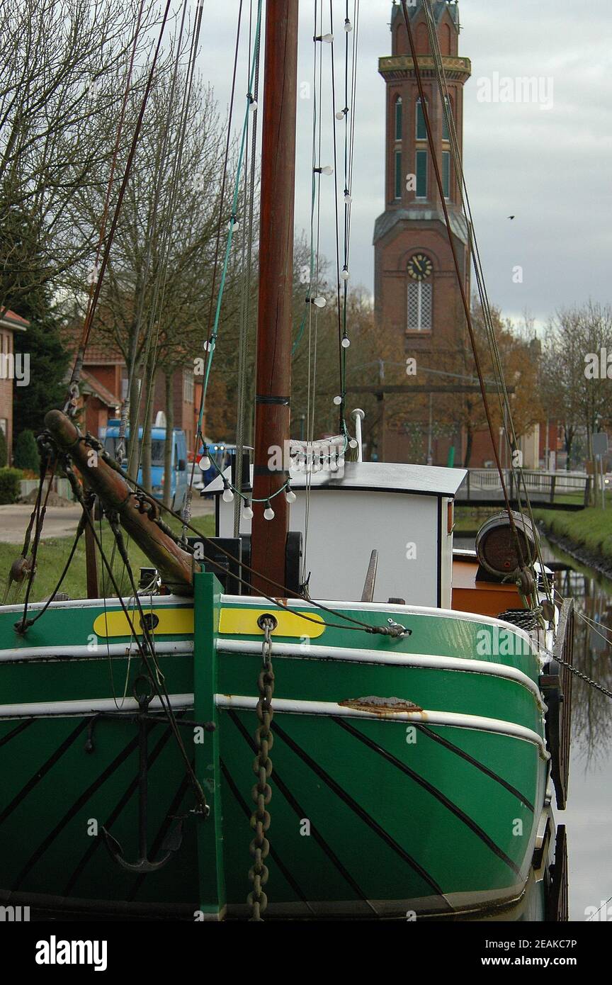 boats and mills in the german eastern frisia Stock Photo - Alamy