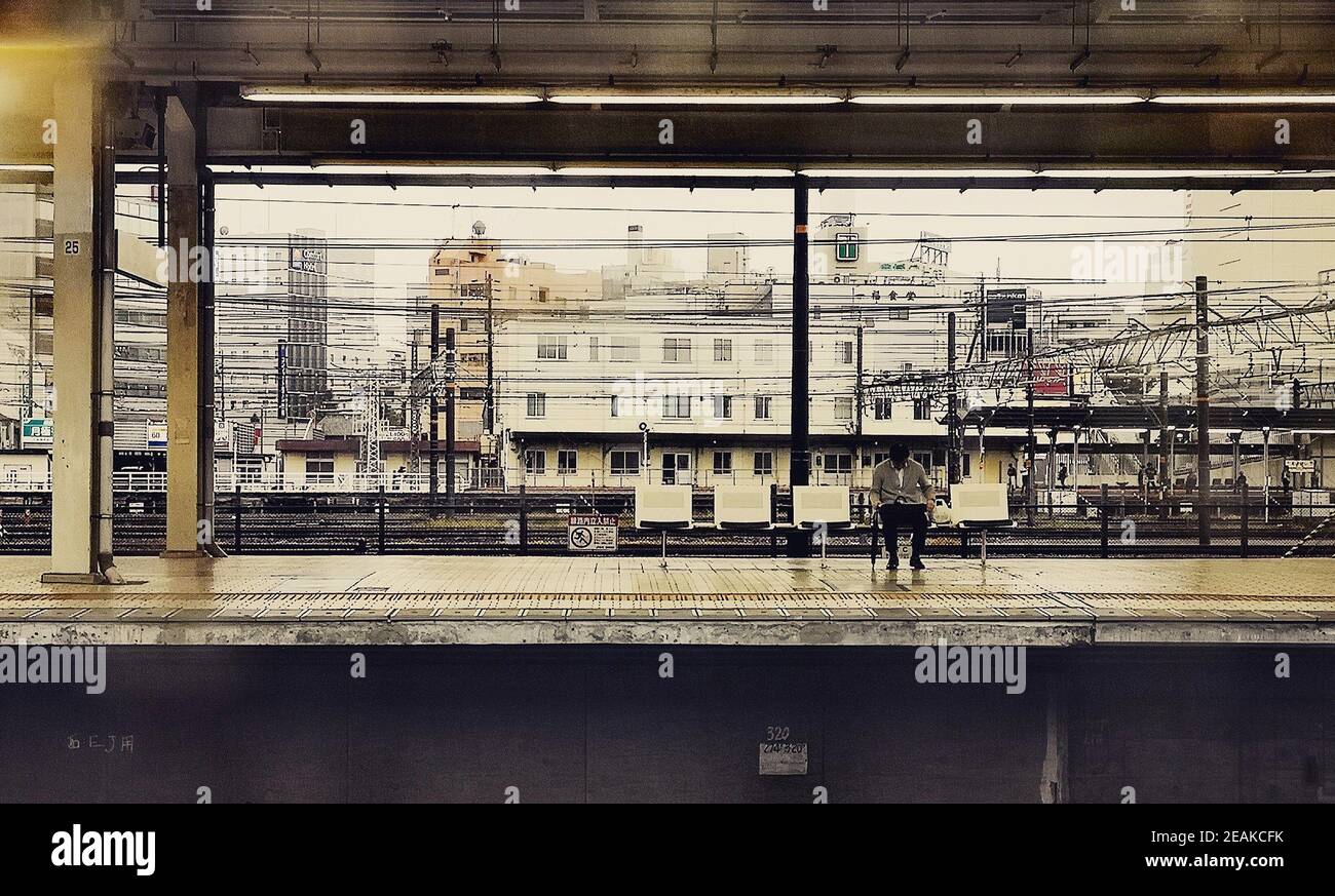 TOKYO, JAPAN - Feb 01, 2021: Photo of a lonley man in empty train ...