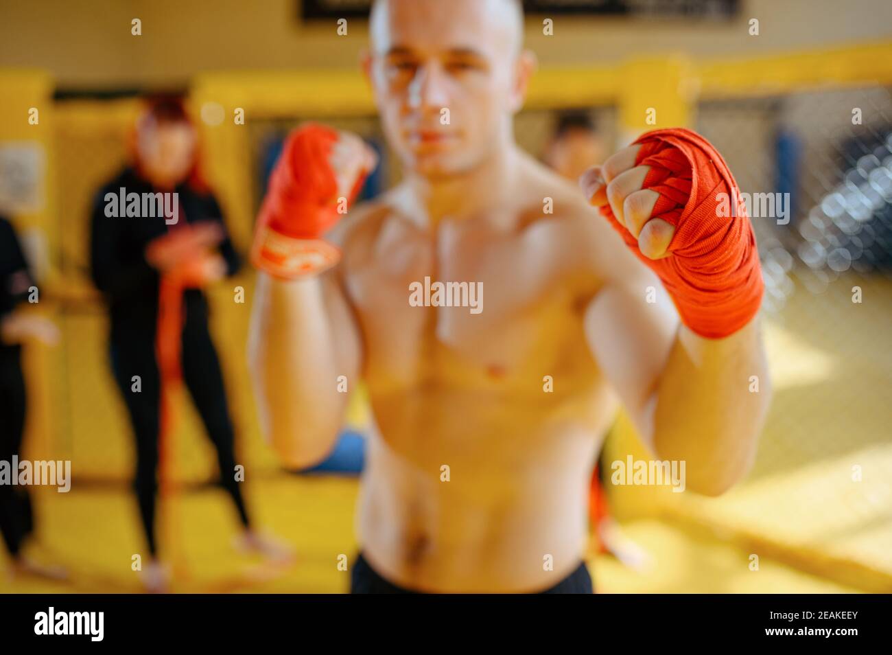 Male MMA fighter with red bandages on his hands Stock Photo - Alamy