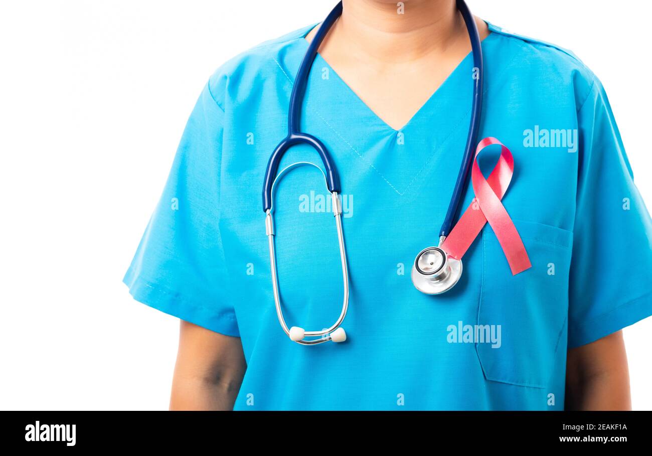 Woman nurse in clinic uniform with support HIV AIDS awareness red ...
