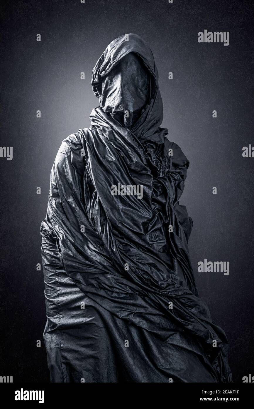Ghostly figure in the dark Stock Photo - Alamy