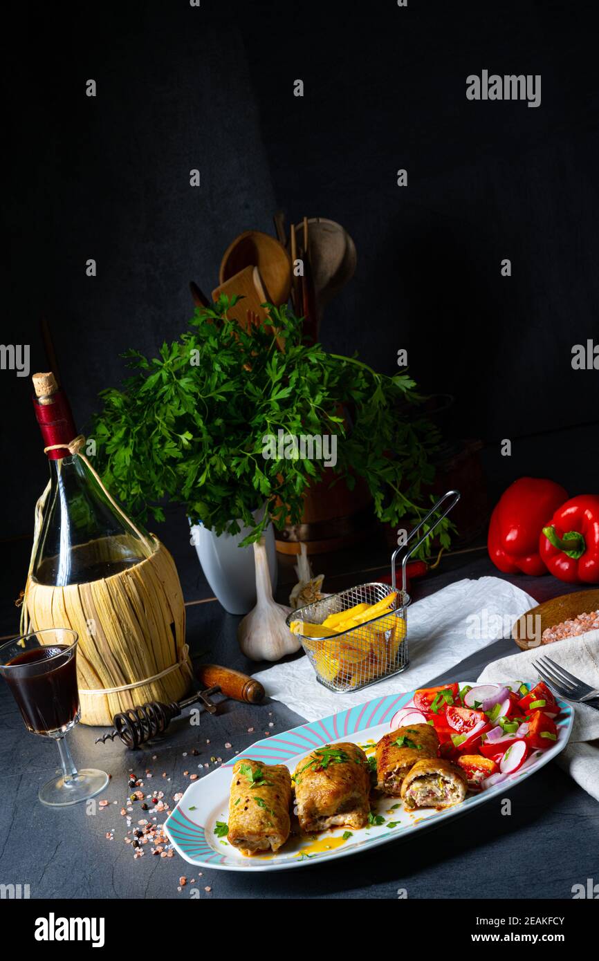 Vegetable roulade from roast pork loins with salads Stock Photo - Alamy