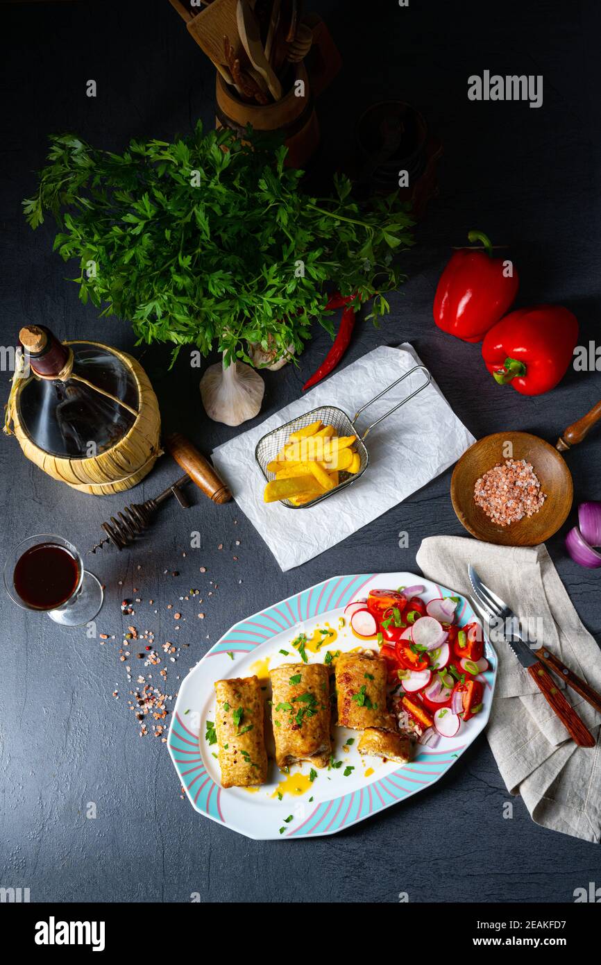 Vegetable roulade from roast pork loins with salads Stock Photo - Alamy