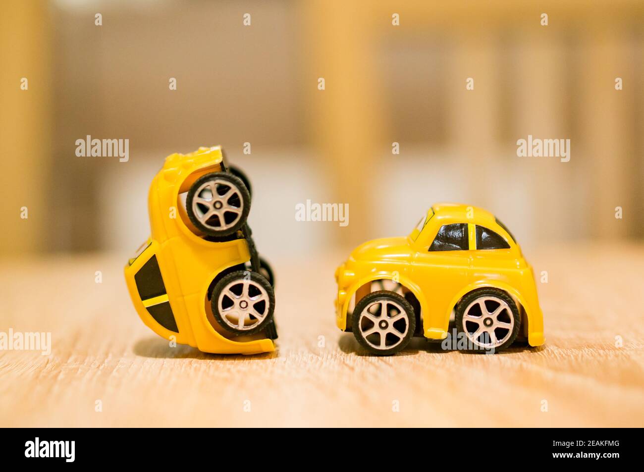 Yellow plastic toy cars Stock Photo - Alamy