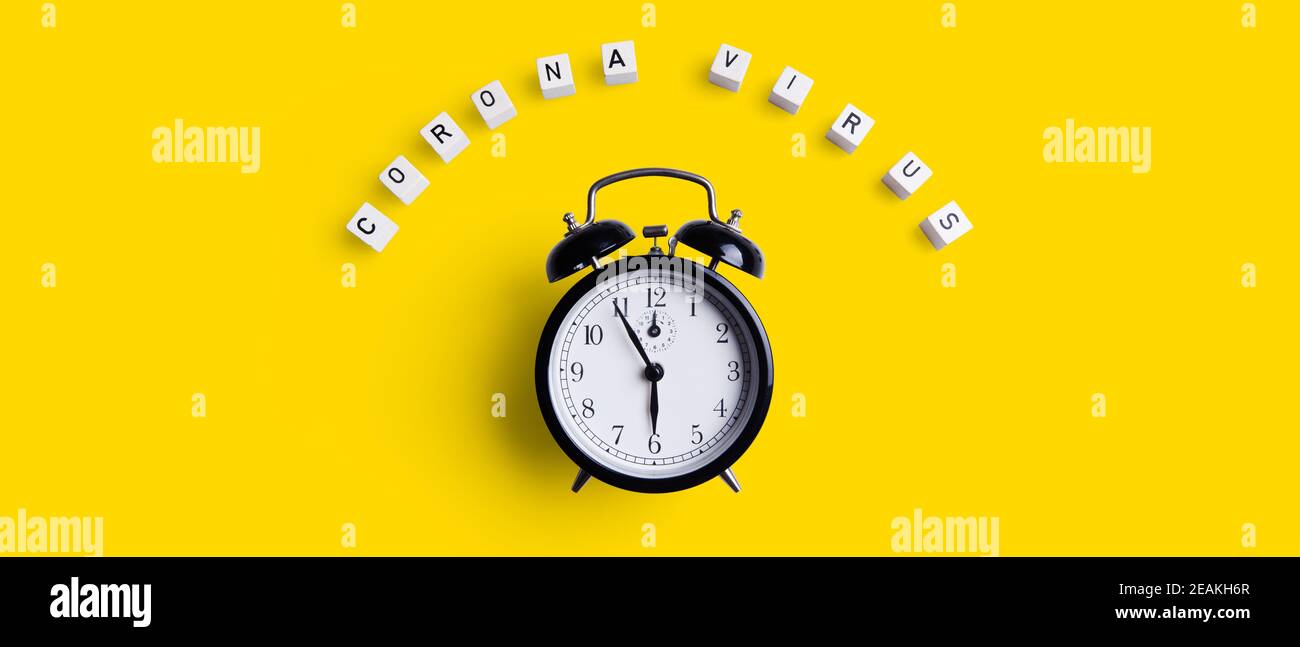 Covid-19 conoravirus deadline with alarm clock. Time is ticking Stock ...