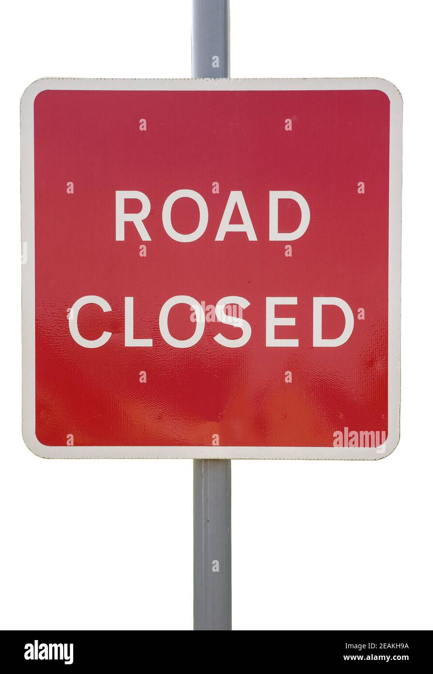 large red closed road sign on white background Stock Photo - Alamy