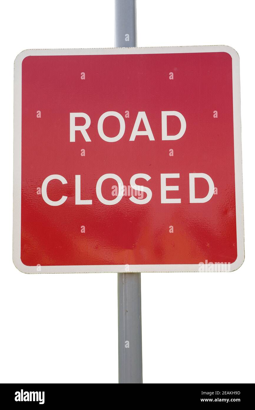 large red closed road sign on white background Stock Photo - Alamy