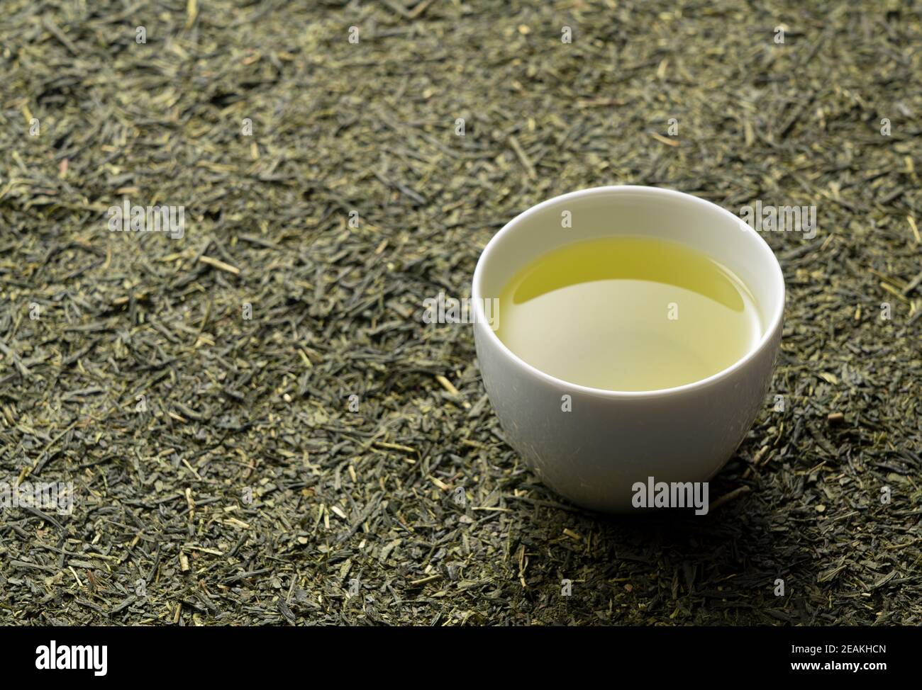 Tea leaves laid across the screen. Green tea placed on it Stock Photo ...