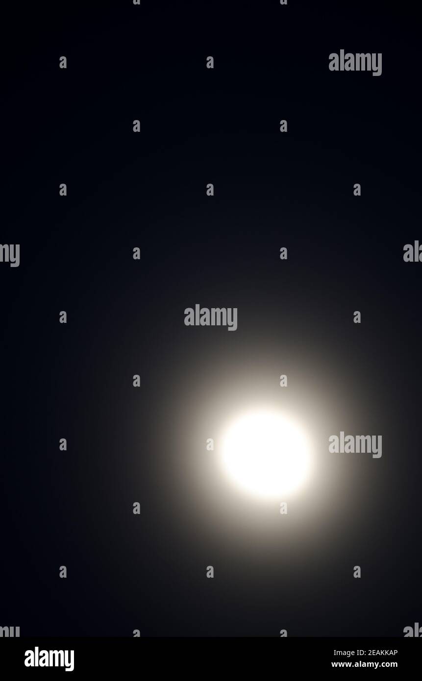 Faded moon over the Integral Natural Reserve of Inagua Stock Photo - Alamy