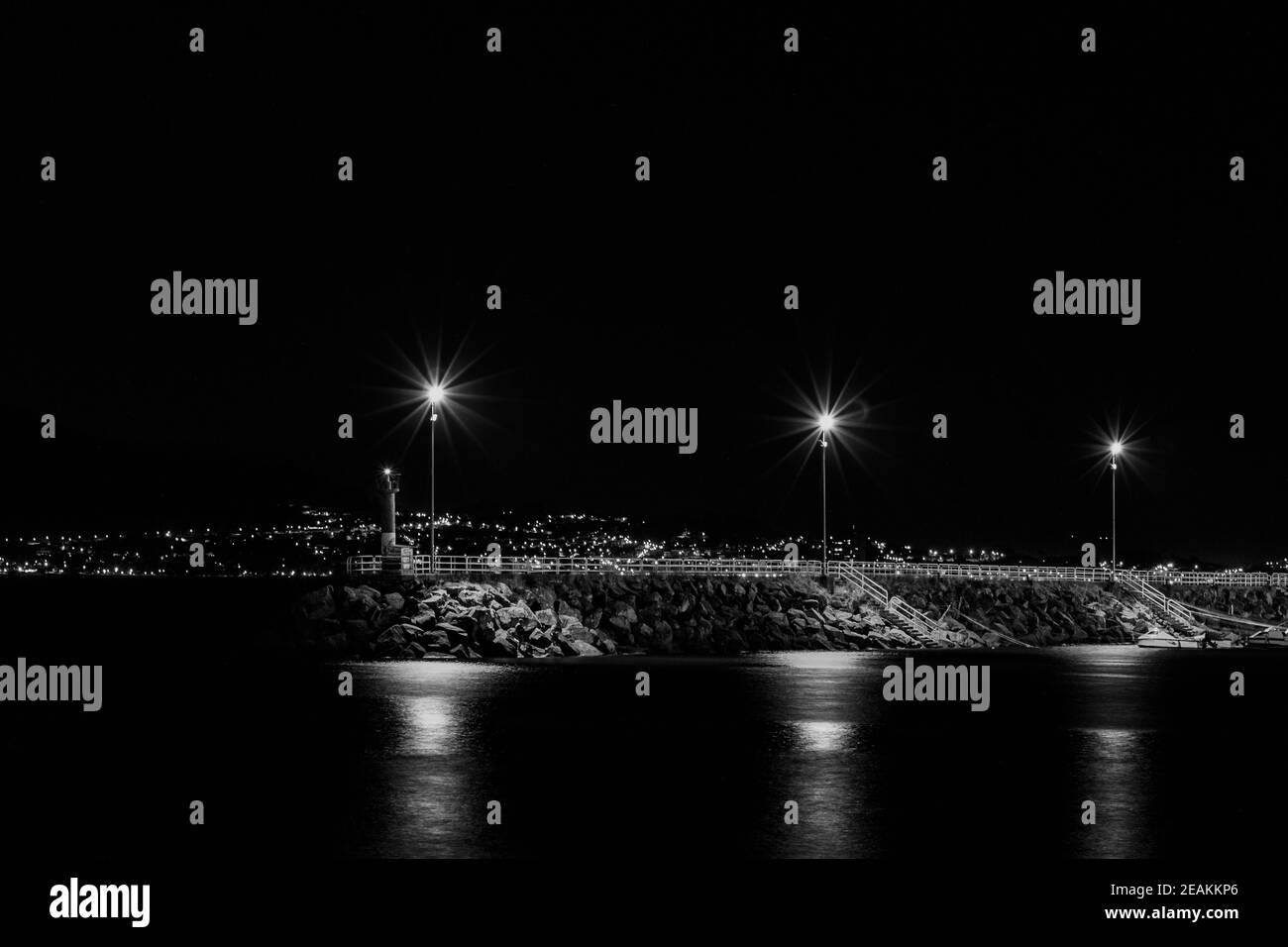 An horizontal shot of the lighthouse during the night Stock Photo - Alamy