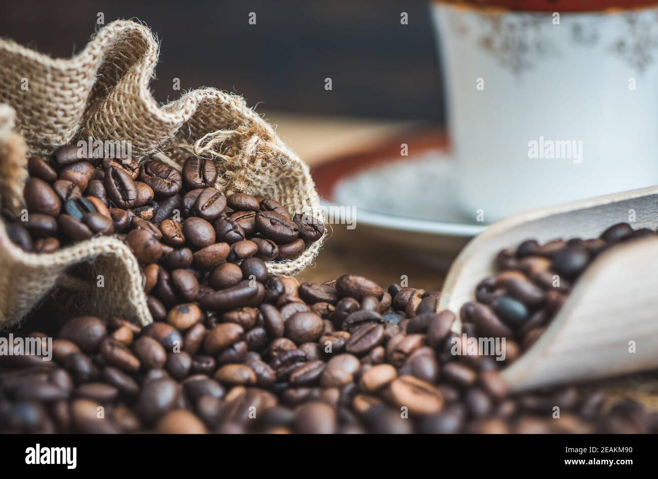 Coffee Beans Spilled out of Burlap Sack Stock Photo - Alamy