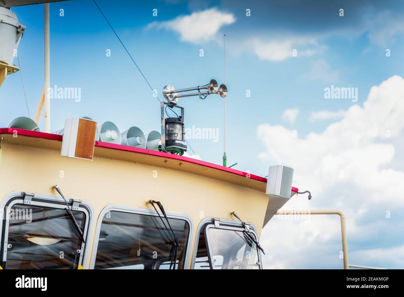 Two chrome ship sirens and set of loudspeakers on the top of the cabin ...