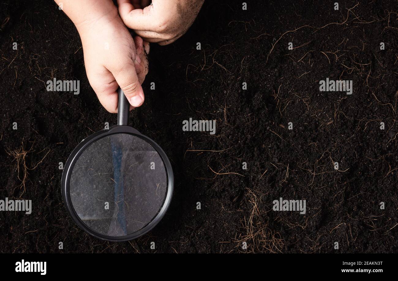 Magnifying glass hand black child hi-res stock photography and images ...