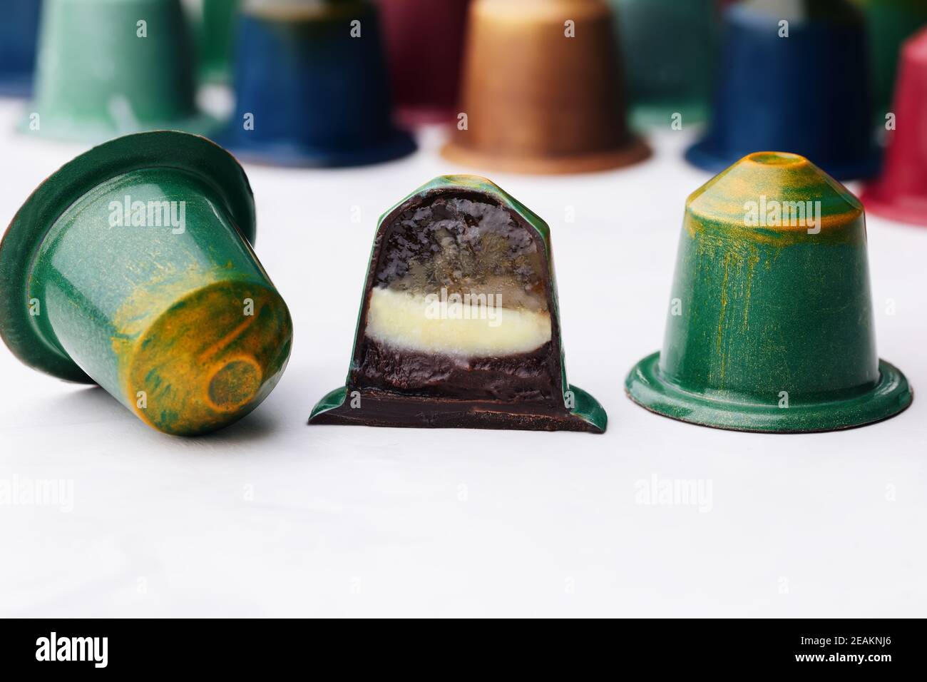 Chocolate candies in the shape of a coffee capsule with lime and mint ...