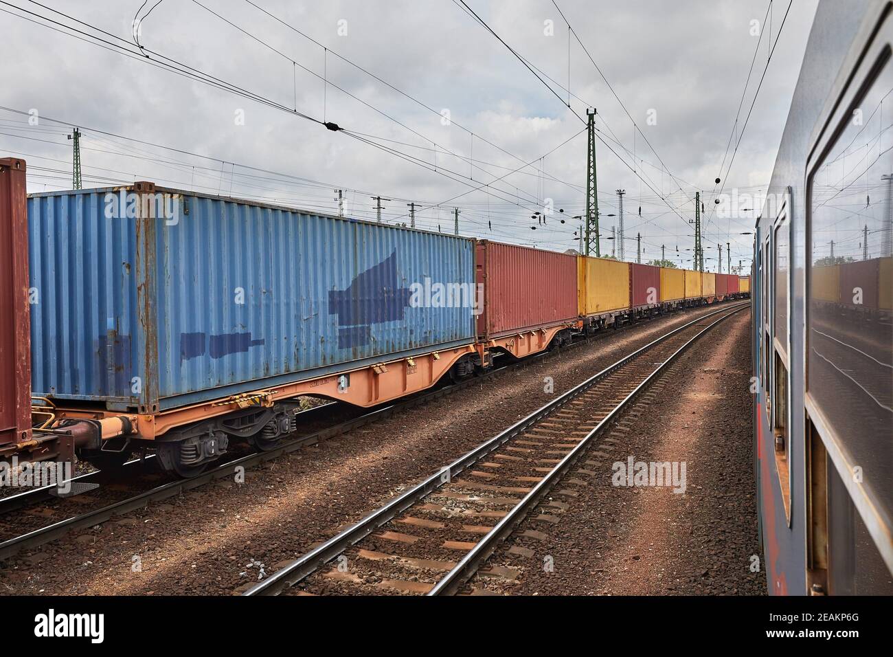 Freight train viewed from passanger window Stock Photo - Alamy