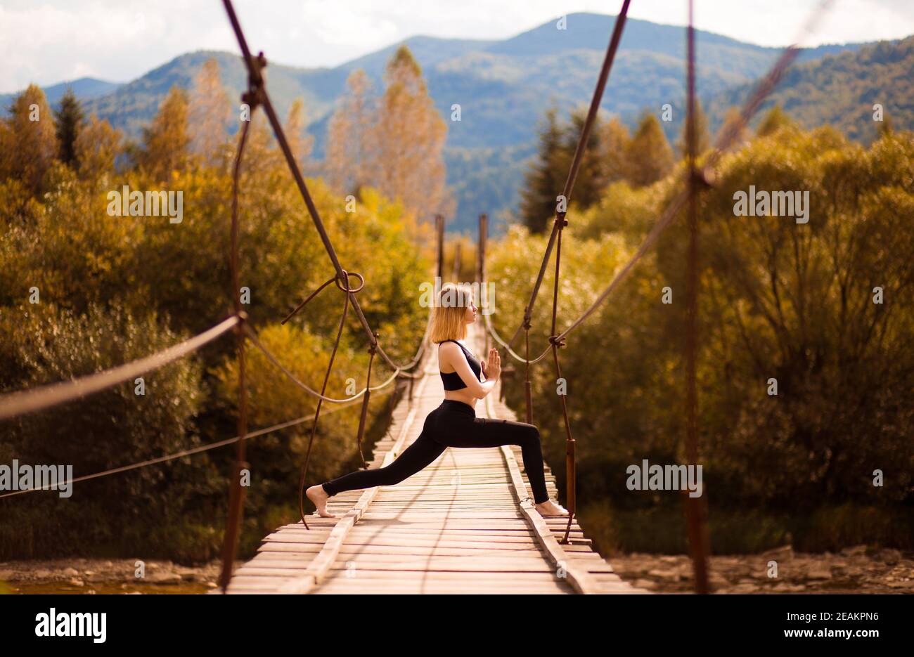 Calm of athlete woman do stretching exercise and relax in yoga pose on ...