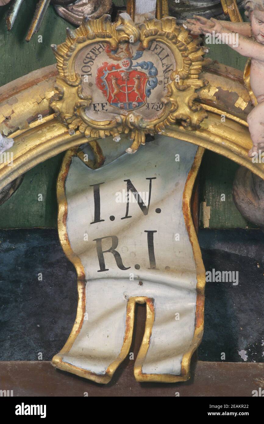 INRI inscription on the altar of the Holy Cross in the Church of Our ...