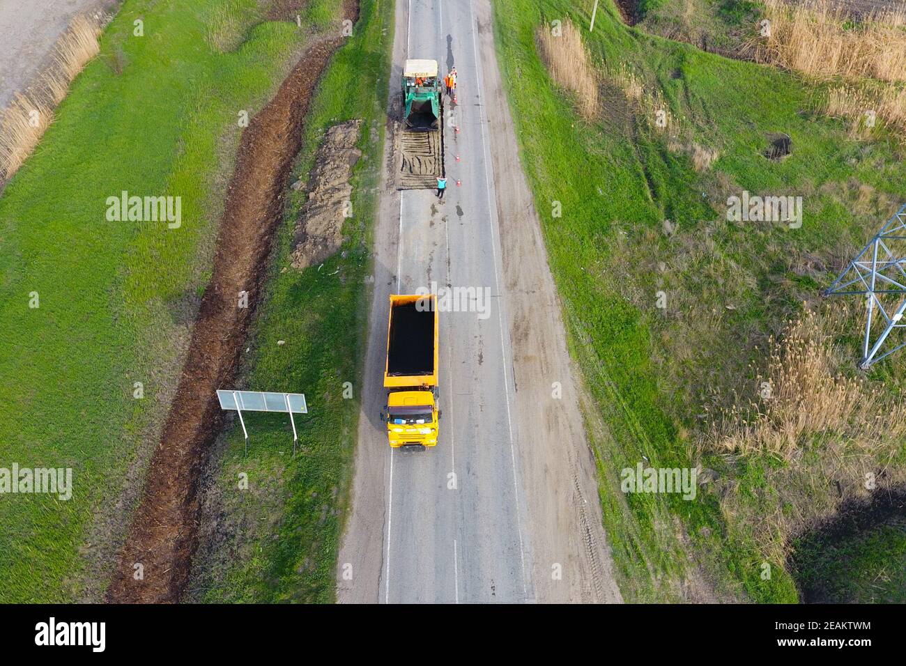 Top view of the road repair. Technics for repair of asphalt ...