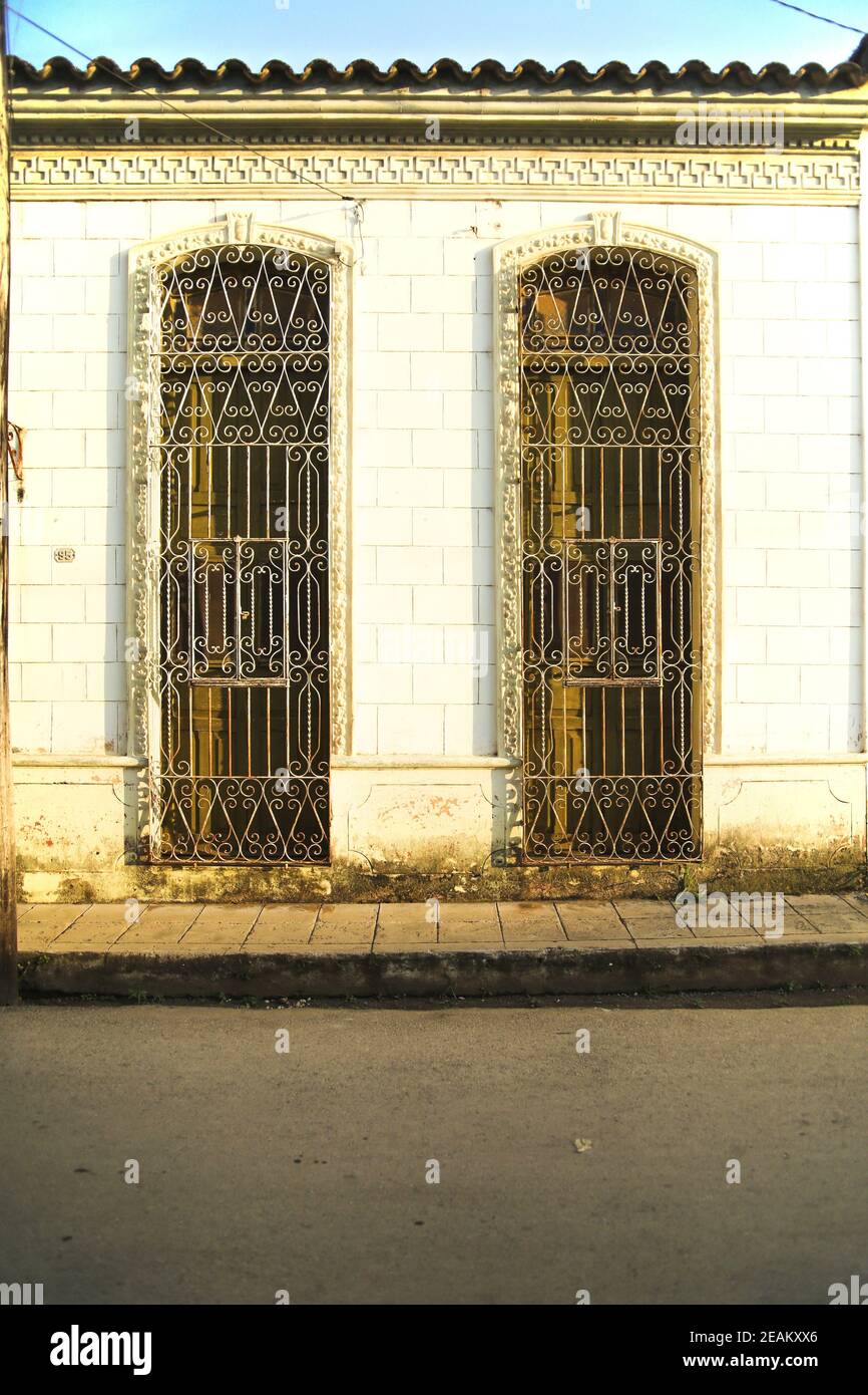 Vertical shot of an old stone wall with beautiful windows Stock Photo ...