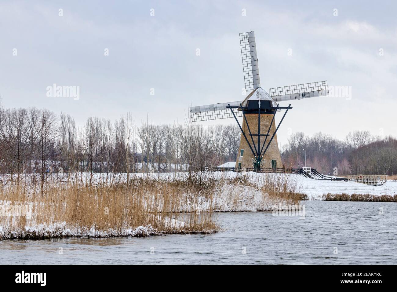 Historic Dutch windmill of Pendrecht Rotterdam in a snowy landscape ...