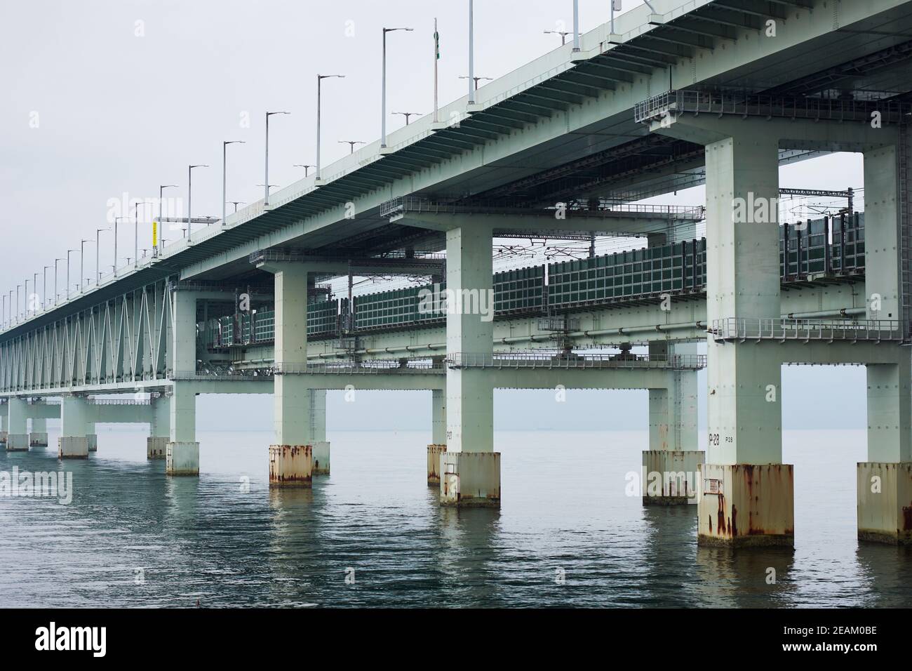 Old pier by the sea with concrete columns Stock Photo - Alamy