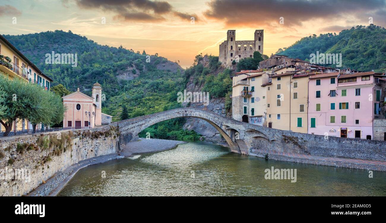 Dolceacqua ancient castle and stone bridge Stock Photo - Alamy