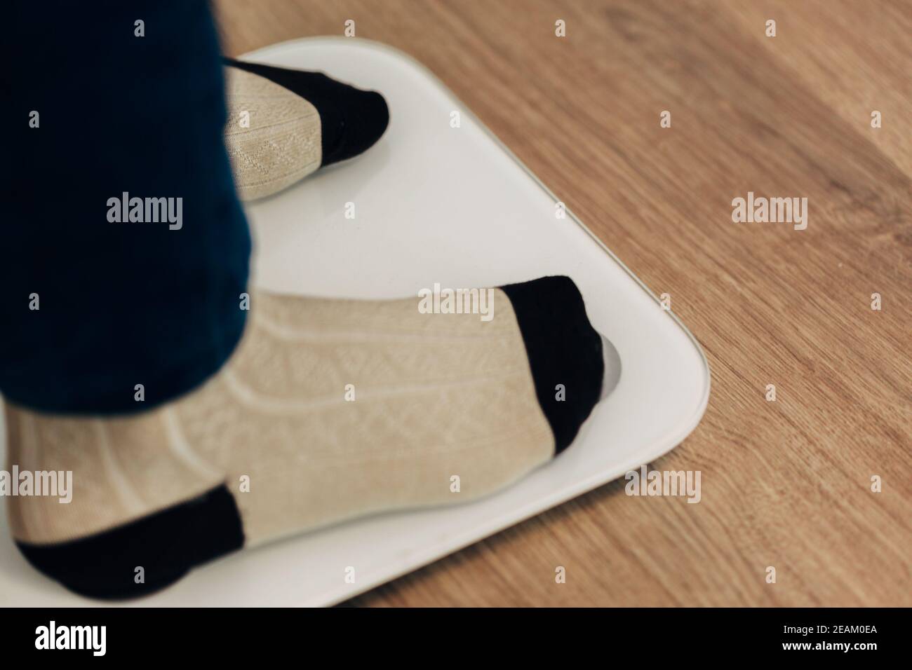 Girl Measures Weight on Smart Scales. Modern Electronic Device Stock ...