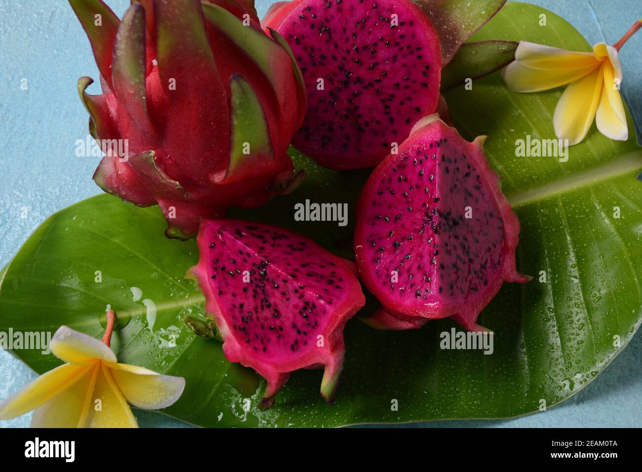 Dragon fruit (Pitaya, Pitahaya) Cut into half, one whole, two sliced ...