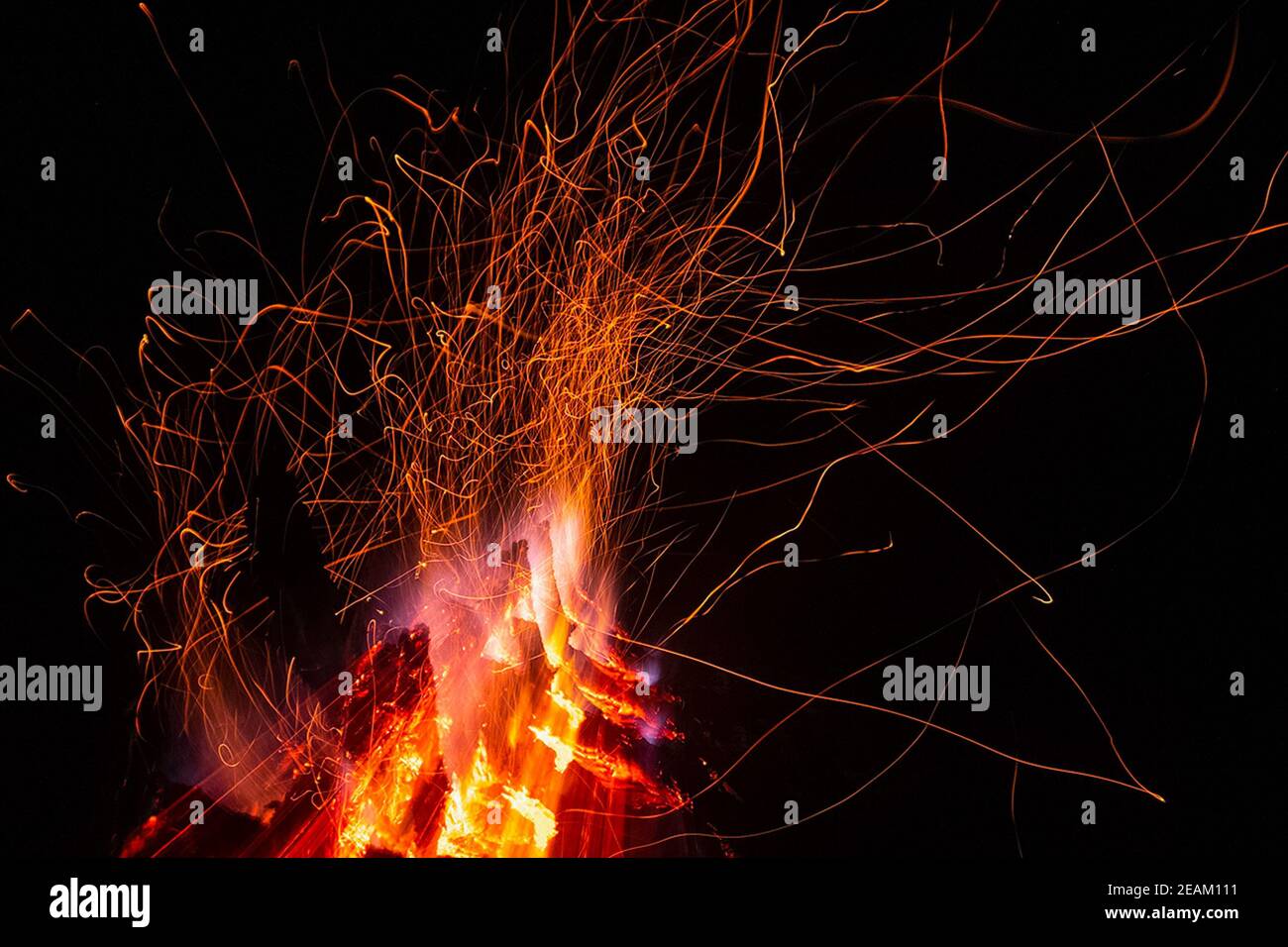 Sparks from a fire against dark night. Bonfire Stock Photo - Alamy
