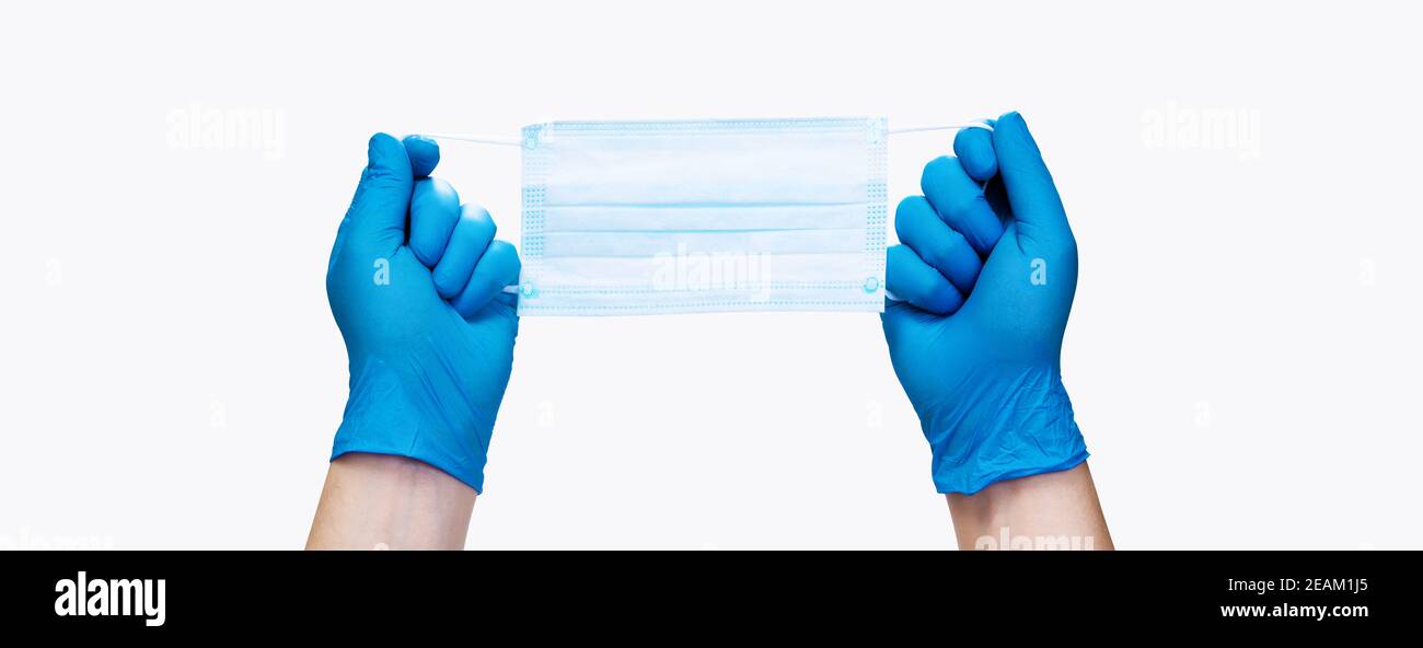 Hand hold medical mask Cut Out Stock Images & Pictures - Alamy