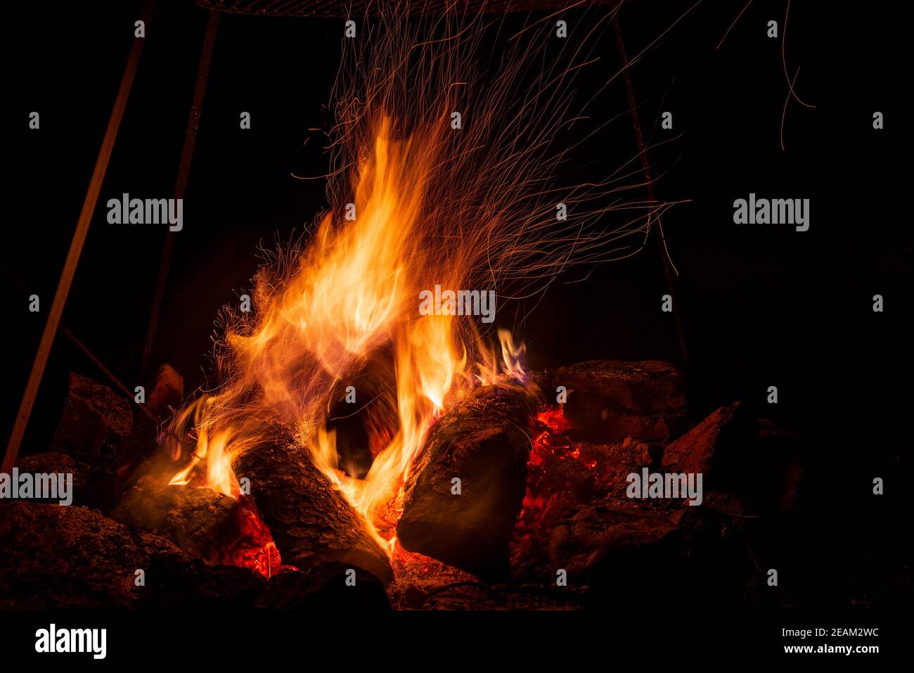 Night campfire with available space. Big bonfire against black ...