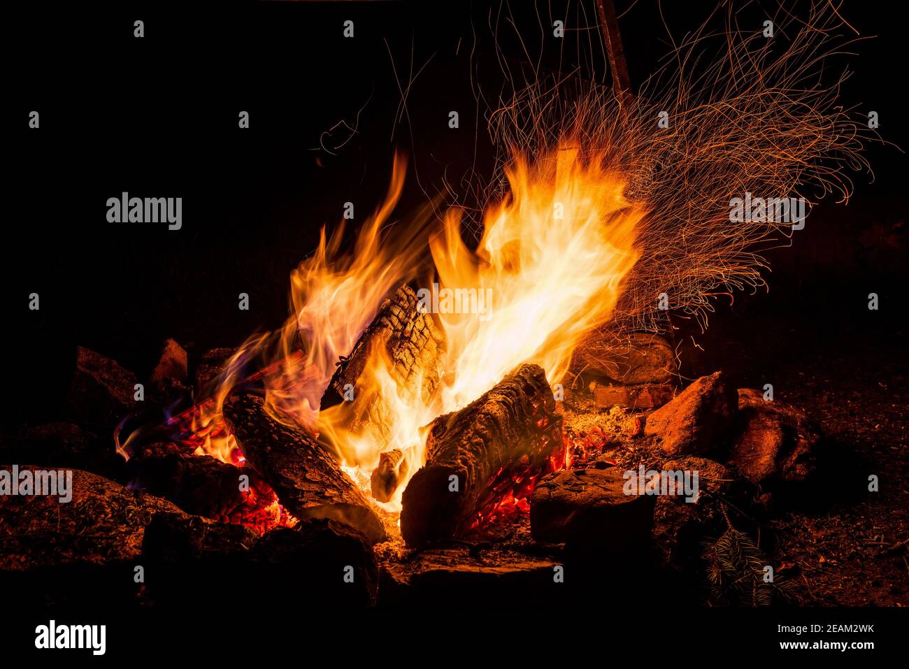 Night campfire with available space. Big bonfire against black ...